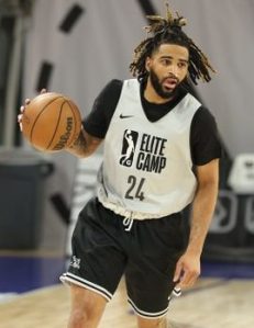 RJ Davis, Caleb Love both productive facing each other in G League ...